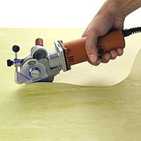 Speedcut hand-held electric cutter capable of cutting all turfs ...